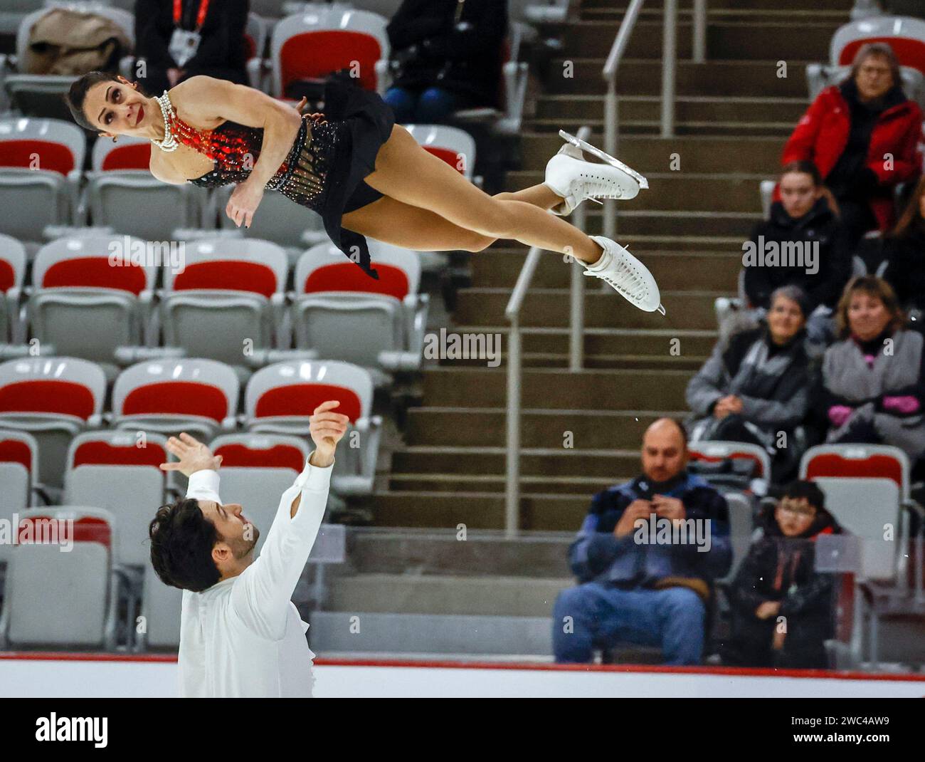 Deanna Stellato-Dudek and Maxime Deschamps, of Quebec, perform during ...