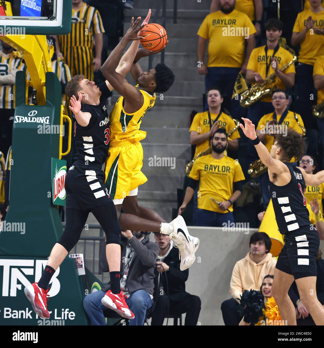 Cincinnati guard Dan Skillings Jr., blocks the shot of Baylor center ...