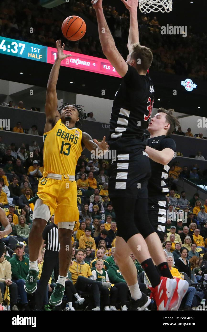 Baylor guard Langston Love (13) shoots over Cincinnati forward Viktor ...