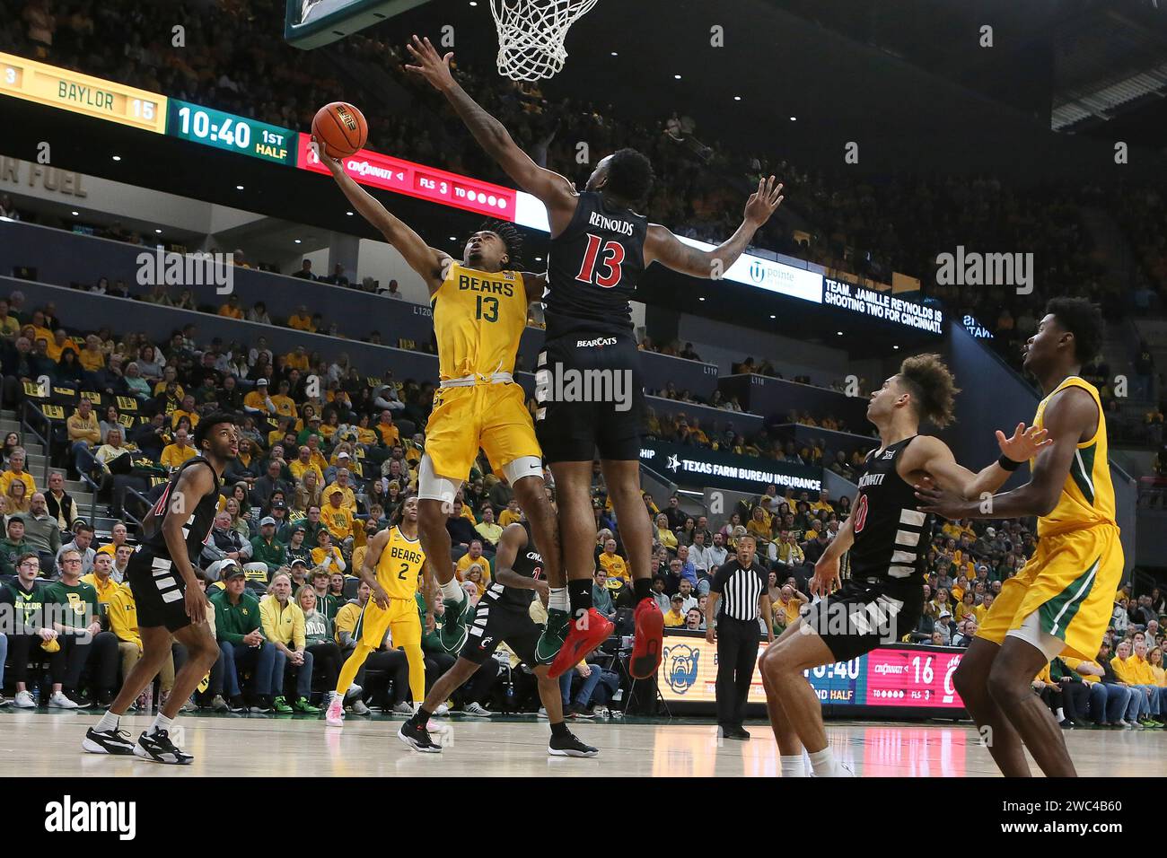 Baylor guard Langston Love shoots against Cincinnati forward Jamille ...