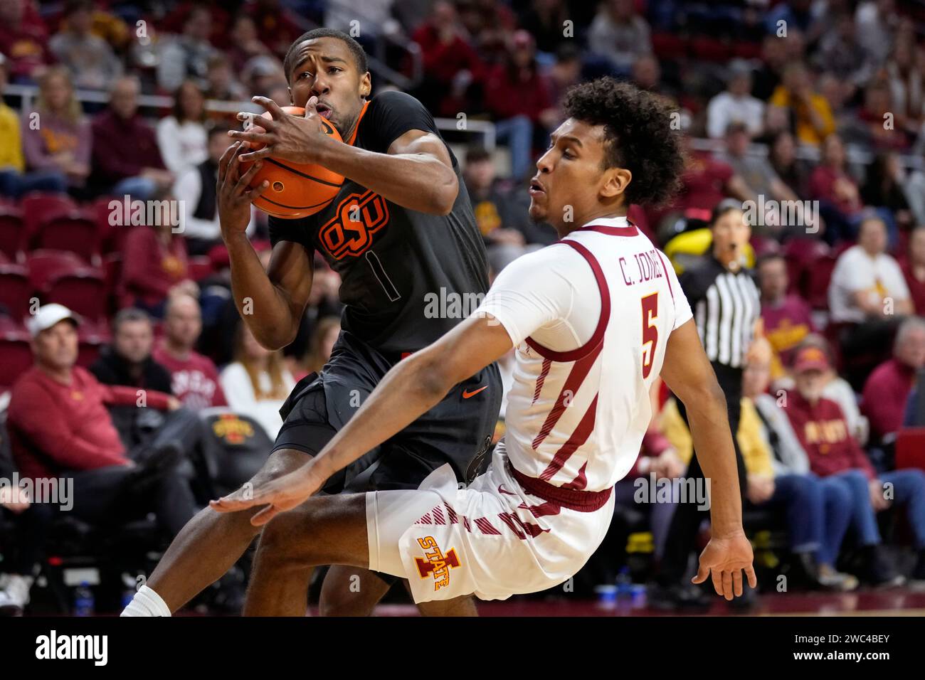 Oklahoma State guard Bryce Thompson (1) fouls Iowa State guard Curtis ...