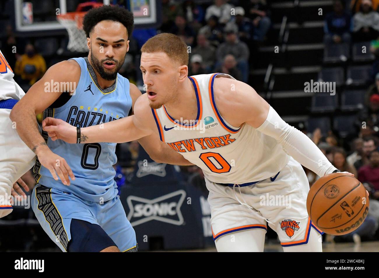 New York Knicks guard Donte DiVincenzo, right, drives against Memphis ...