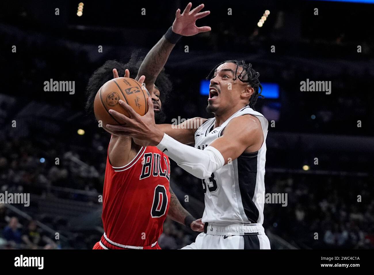 San Antonio Spurs guard Tre Jones (33) drives to the basket against ...