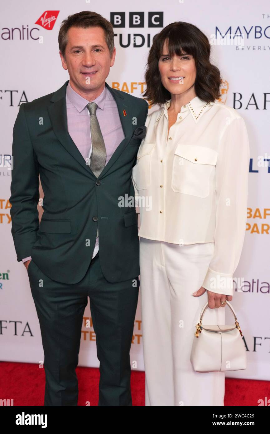 From left, Michael A. Goorjian and Neve Campbell arrive at the BAFTA ...