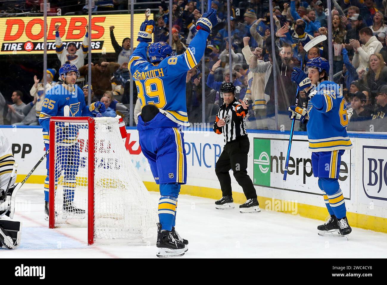 St. Louis Blues' Jake Neighbours, right, and teammates celebrate his ...