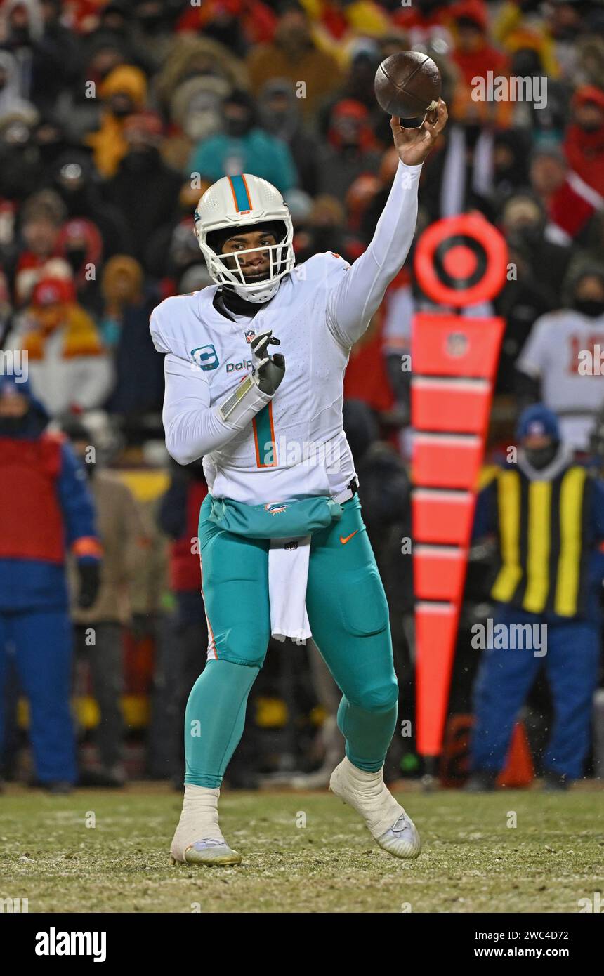 Miami Dolphins quarterback Tua Tagovailoa (1) throws a pass during an NFL wild-card playoff ...