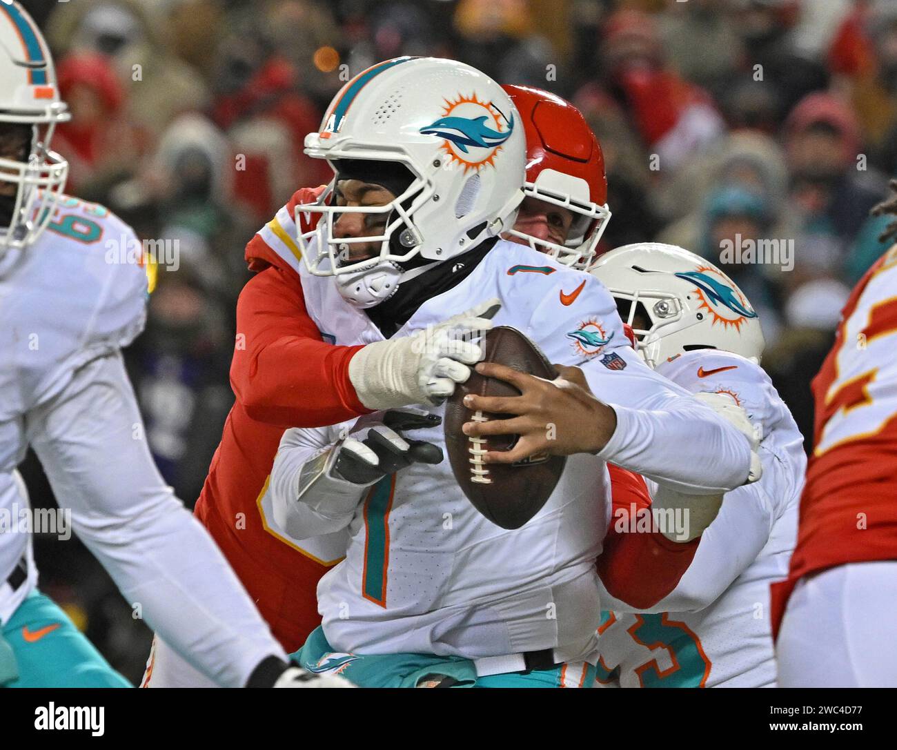 Miami Dolphins quarterback Tua Tagovailoa (1) is sacked by Kansas City ...