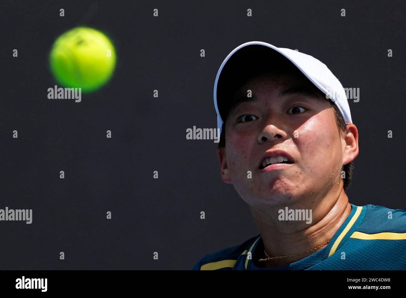 Bai Zhuoxuan of China plays a forehand return to Elina Avanesyan of ...
