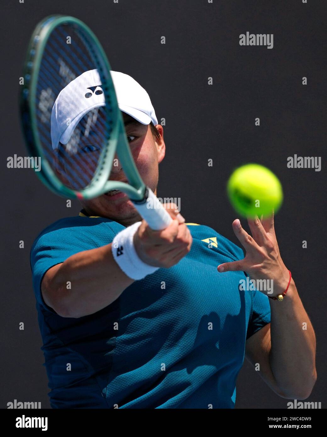Bai Zhuoxuan of China plays a forehand return to Elina Avanesyan of ...