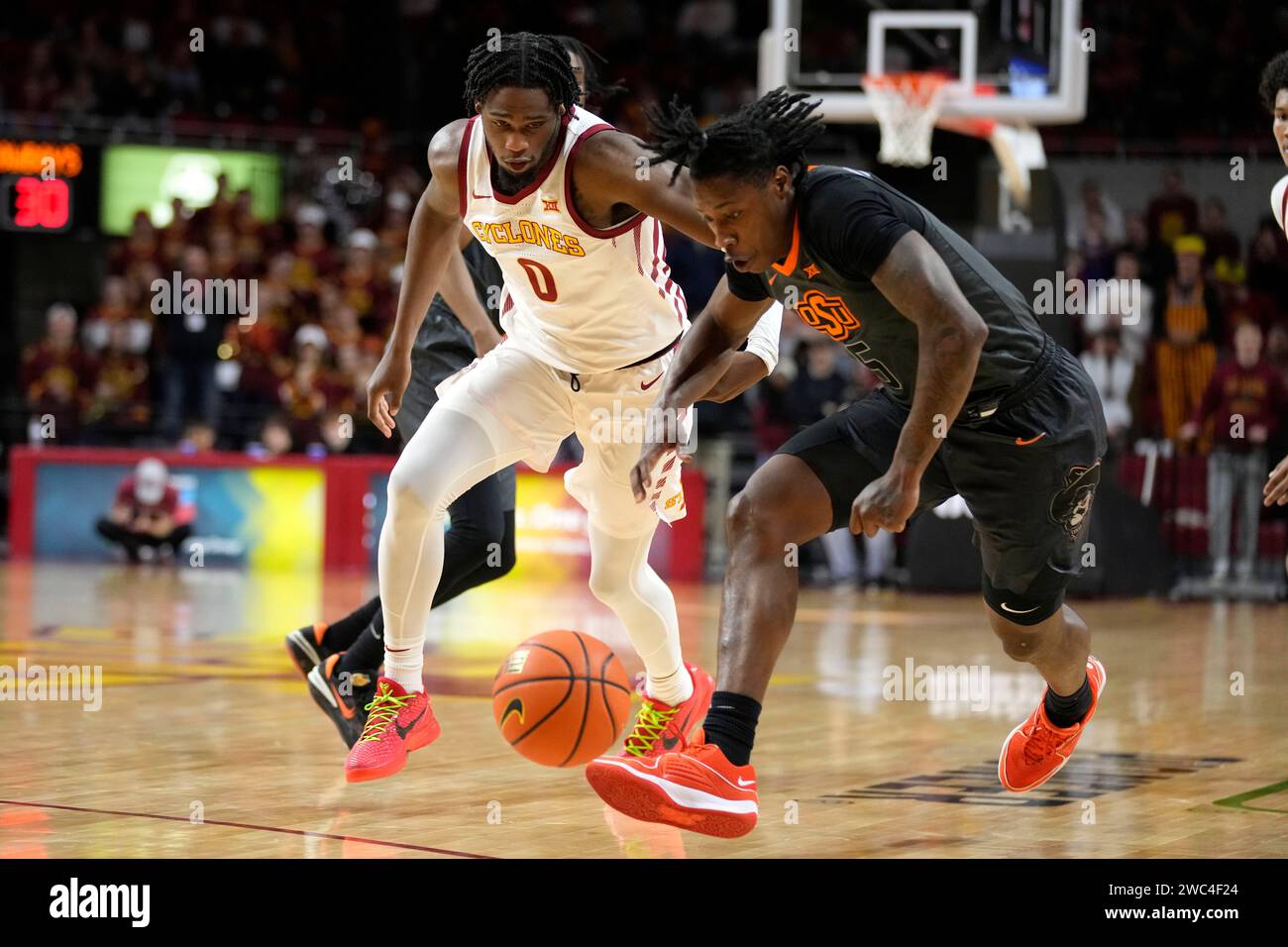 Iowa State forward Tre King (0) fights for a loose ball with Oklahoma ...