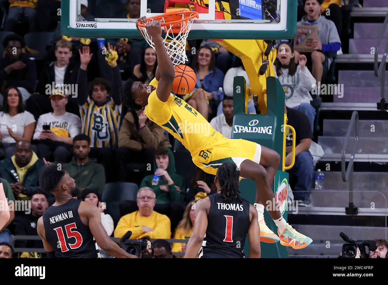 Baylor forward Josh Ojianwuna (15) dunks next to Cincinnati forward ...