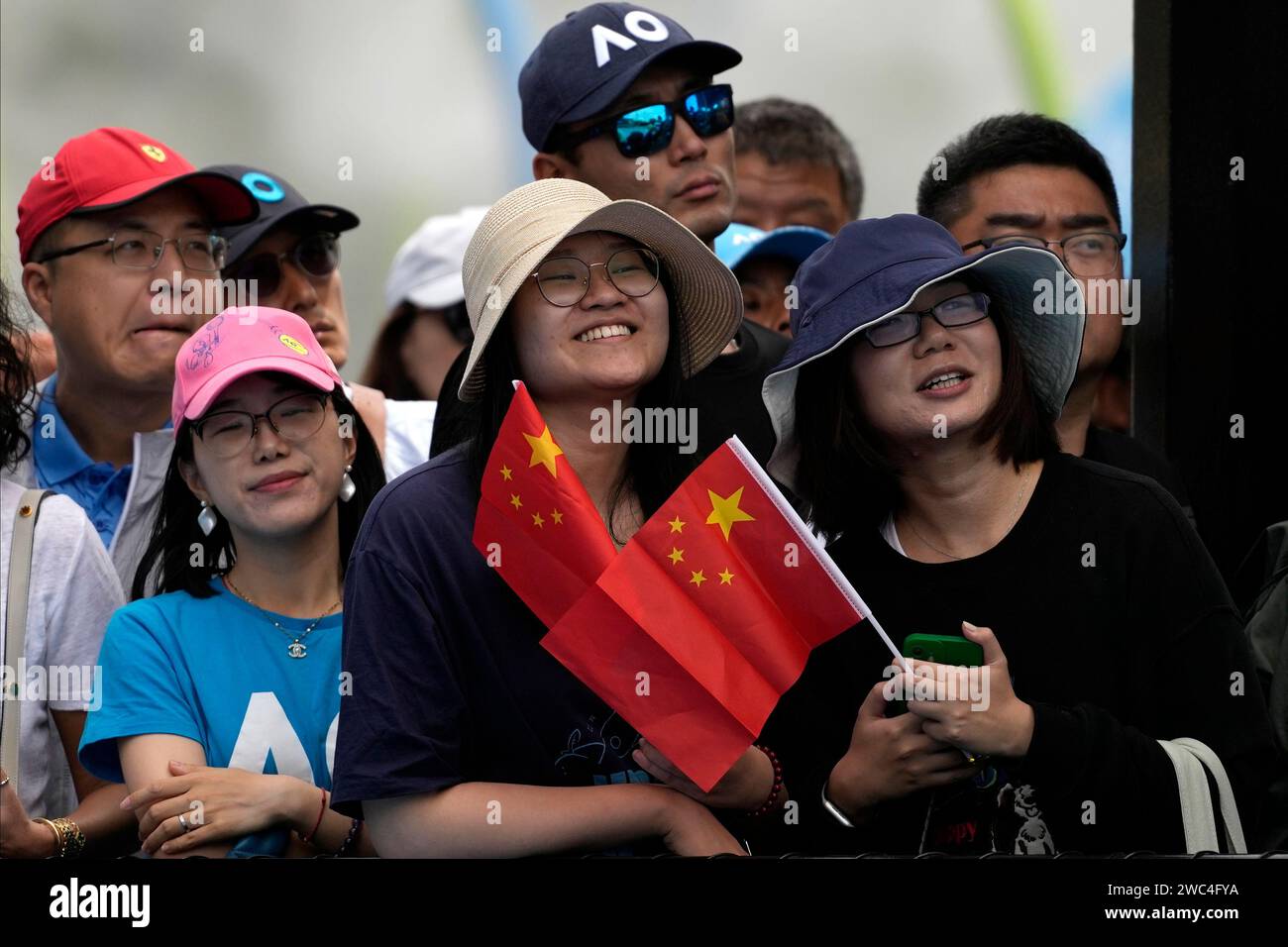 Supporters of Bai Zhuoxuan of China watch her first round match against ...