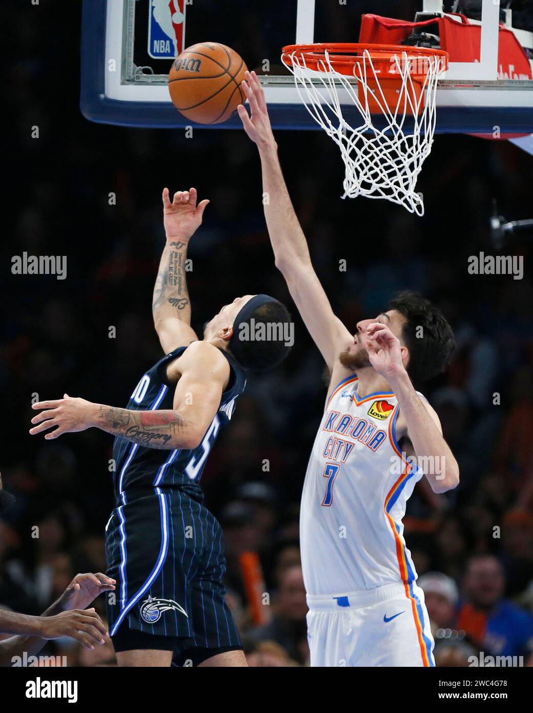 Oklahoma City Thunder forward Chet Holmgren, right, blocks a shot by ...