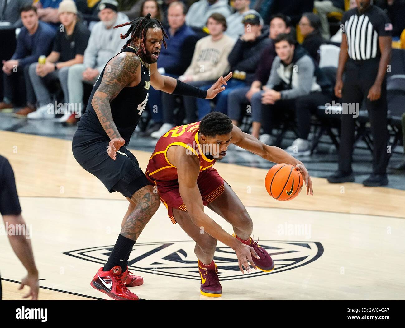 Southern California forward Arrinten Page, right, drives past Colorado ...