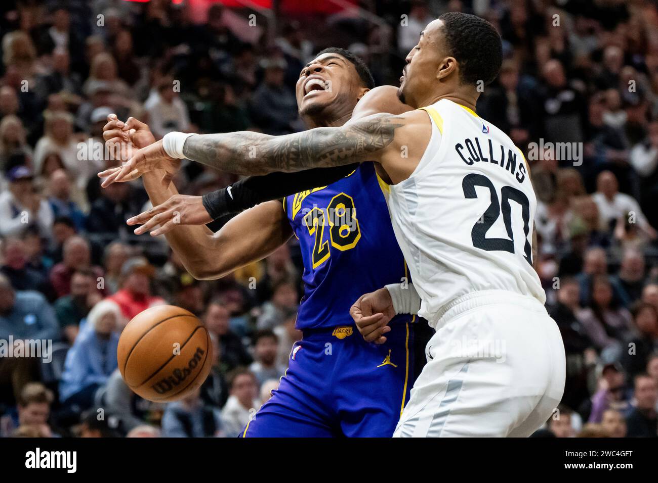 Utah Jazz forward John Collins (20) draws the foul as Los Angeles ...