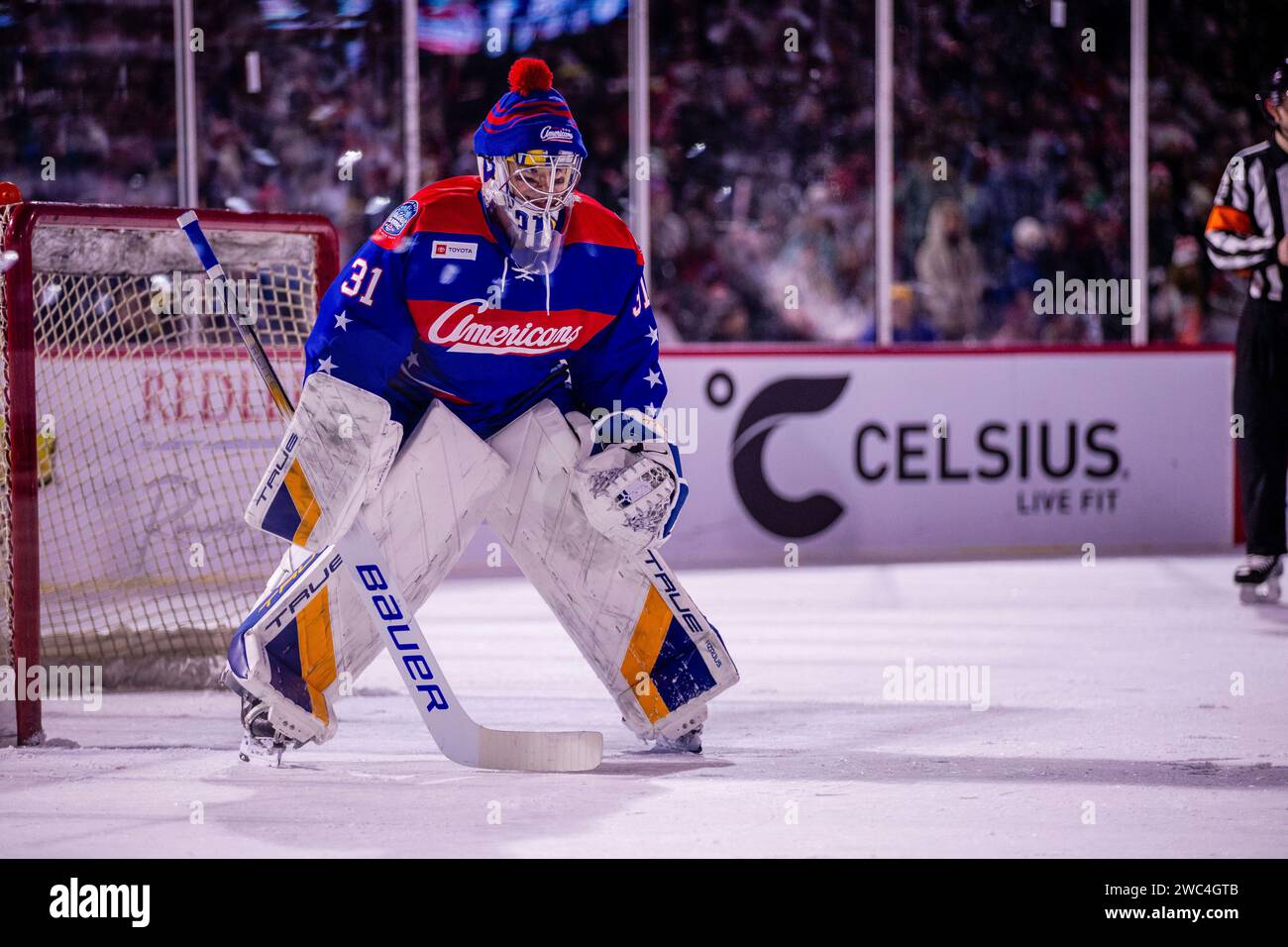 January 13, 2024: Rochester Americans Eric Comrie (31) sets up in goal ...