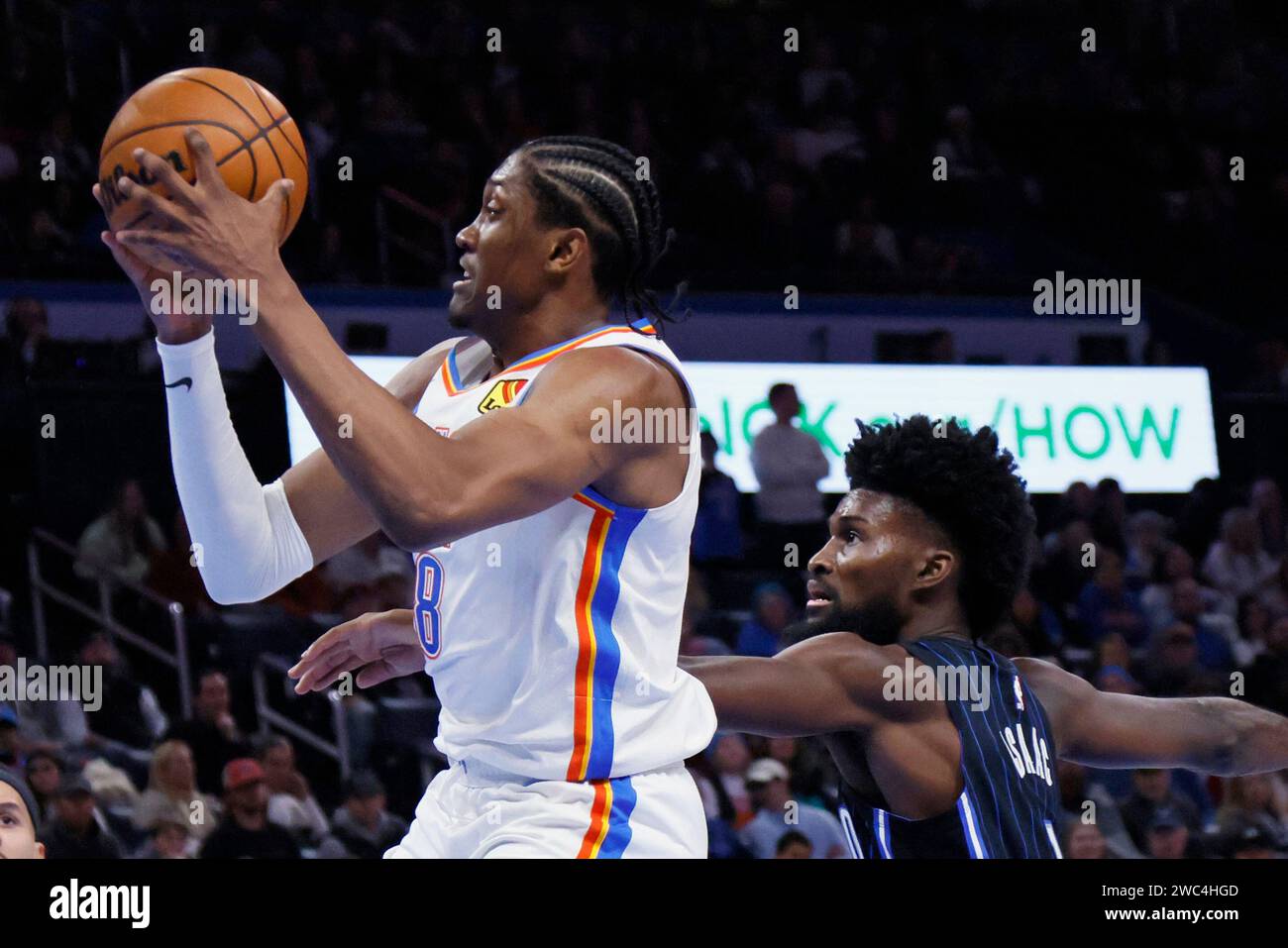 Oklahoma City Thunder forward Jalen Williams, left, catches a pass in ...
