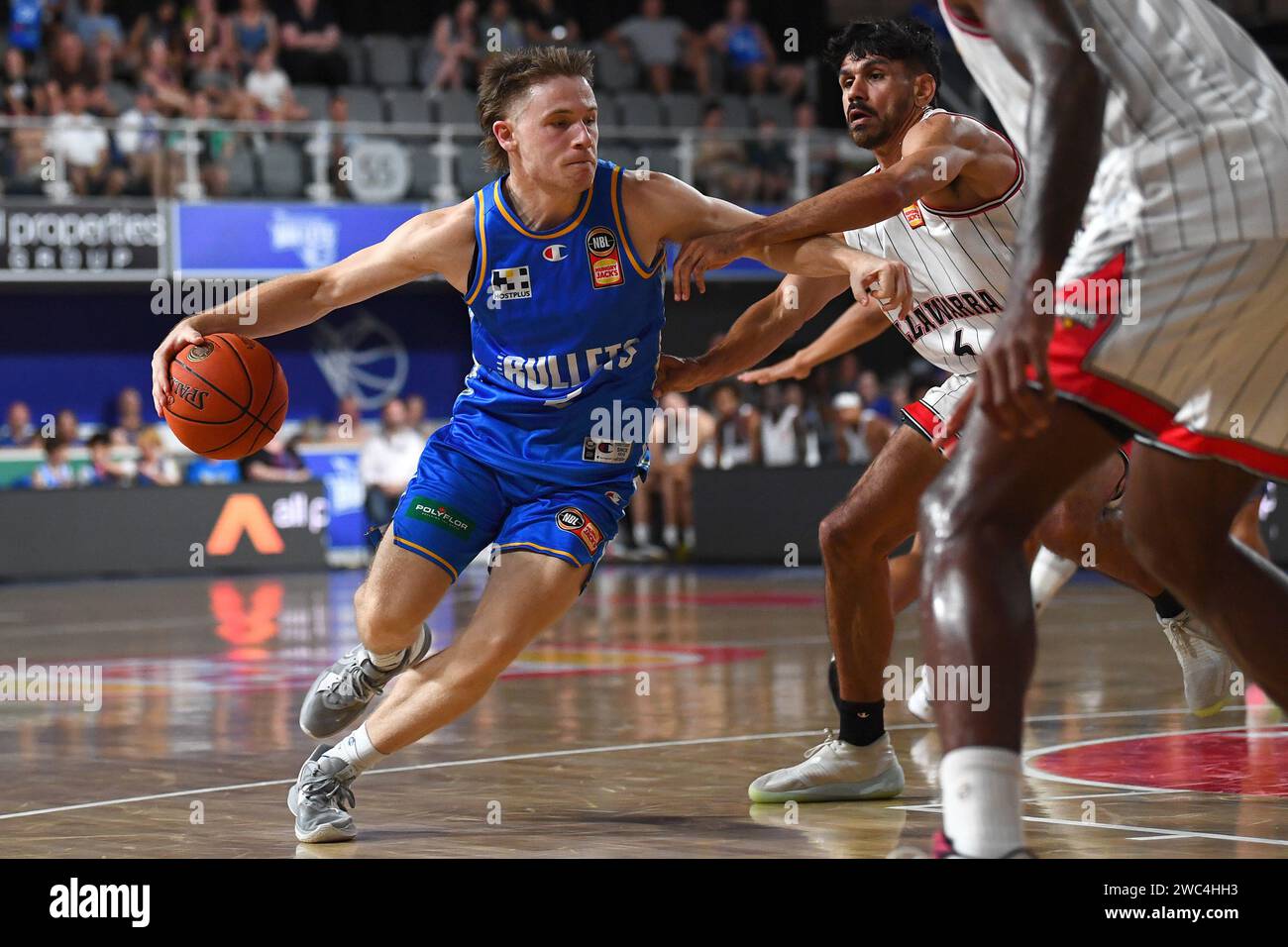 Brisbane, Australia. 14th Jan, 2024. Isaac White of the Bullets makes a ...