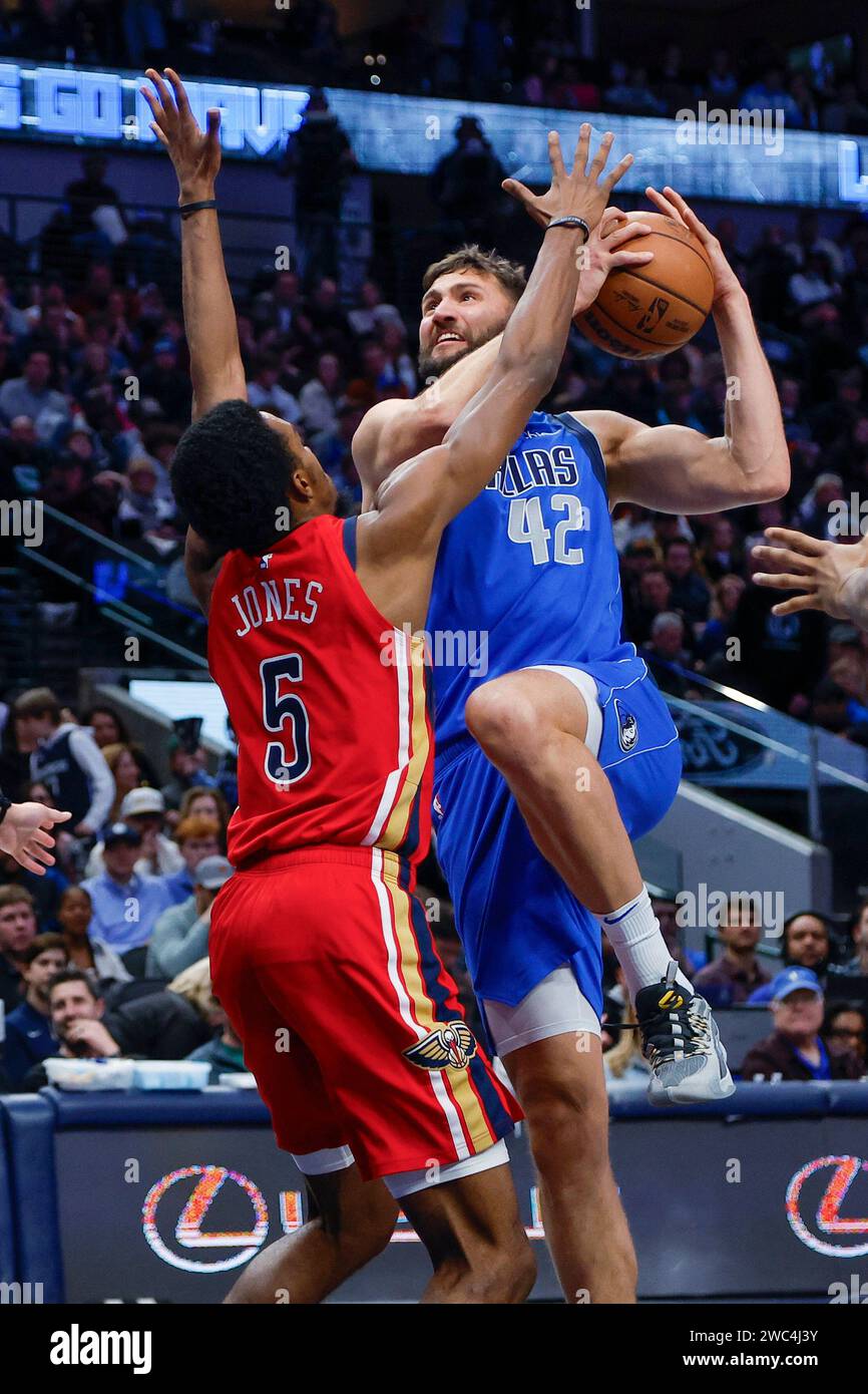 Dallas Mavericks forward Maxi Kleber (42) is defended by New Orleans Pelicans forward Herbert ...