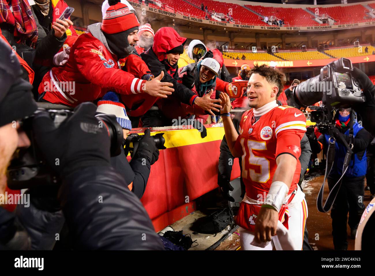 Kansas City Chiefs quarterback Patrick Mahomes greets fans after they ...
