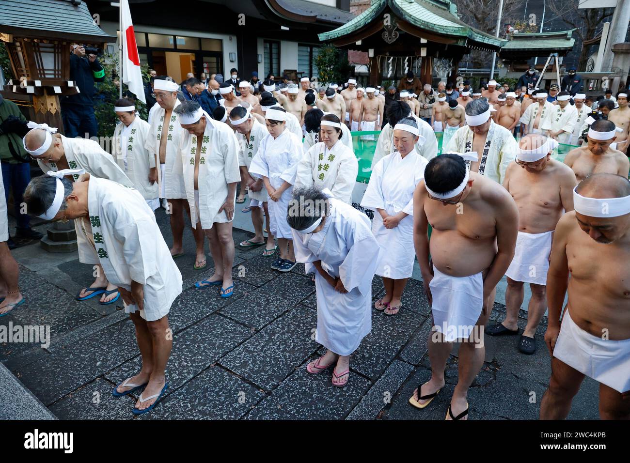Tokyo, Japan. 14th Jan, 2024. Participants dressed only in loincloths ...