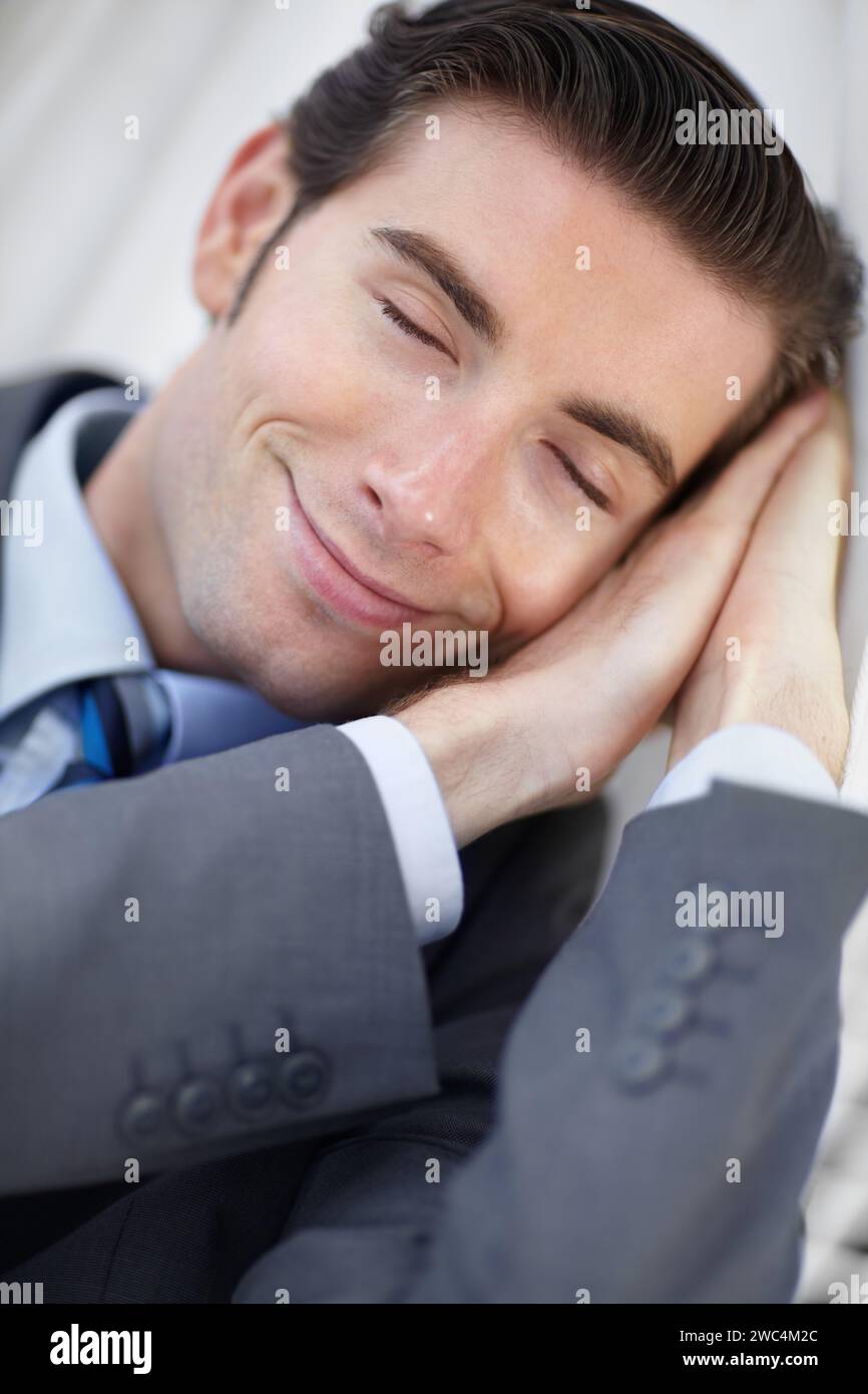 Sleeping, peace and tired business man in a hammock with low energy ...