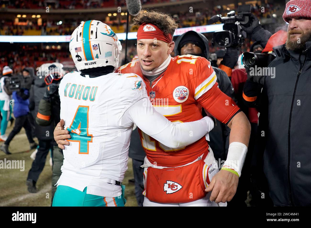 Miami Dolphins cornerback Kader Kohou (4) hugs Kansas City Chiefs ...