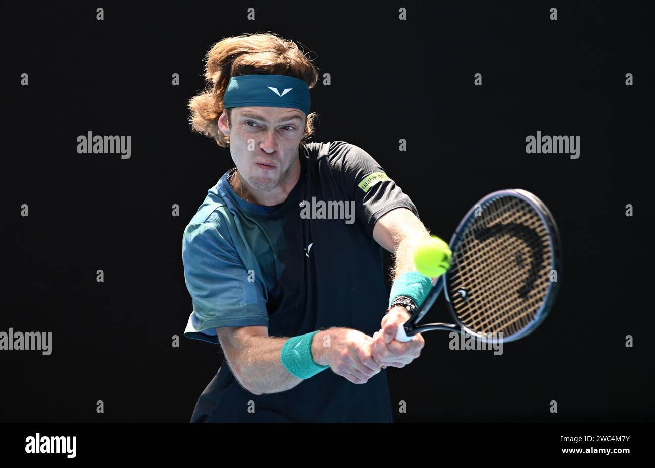 Melbourne, Australia. 14th Jan, 2024. Andrey Rublev of Russia returns to Thiago Seyboth Wild of ...