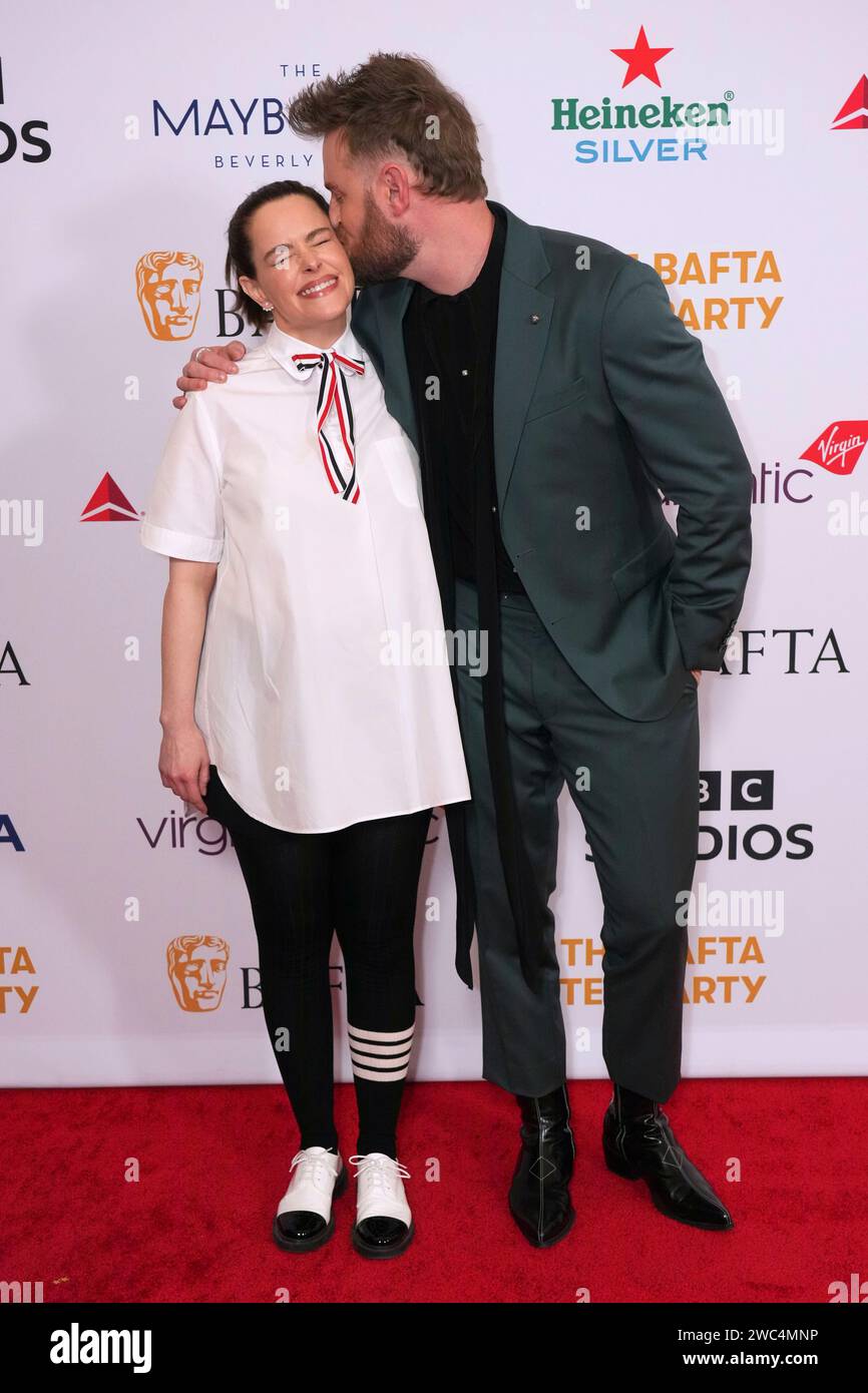 From left, Emily Hampshire and Bobby Berk arrive at the BAFTA Tea Party ...