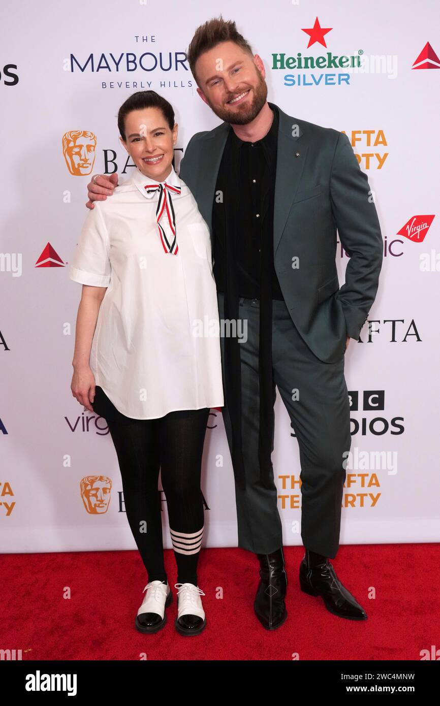 From left, Emily Hampshire and Bobby Berk arrive at the BAFTA Tea Party ...