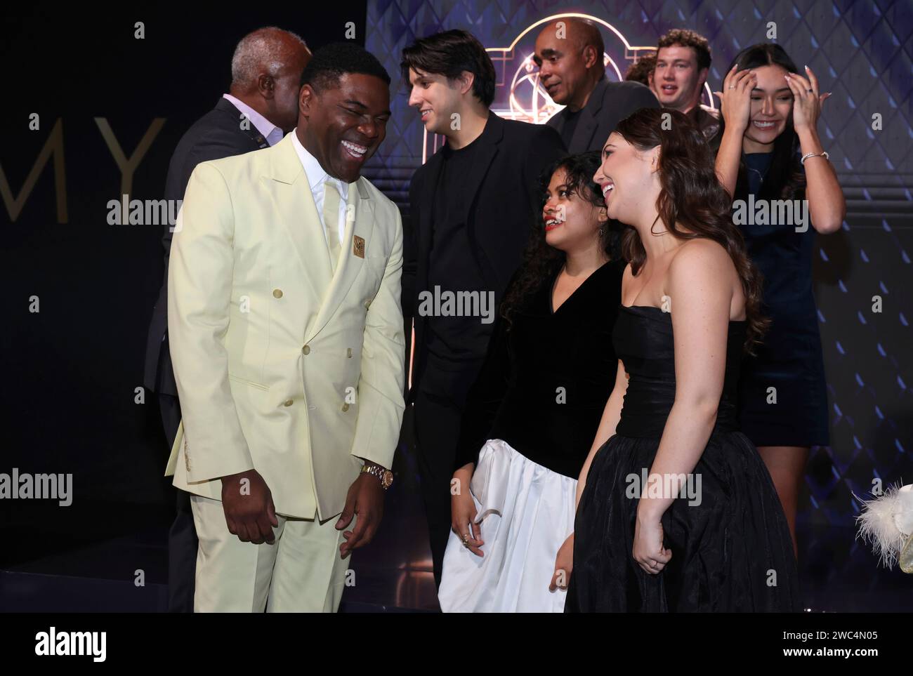 Sam Richardson, from left, Nuha Jes Izman, and Samantha Hanratty attends the 75th Emmy Awards ...