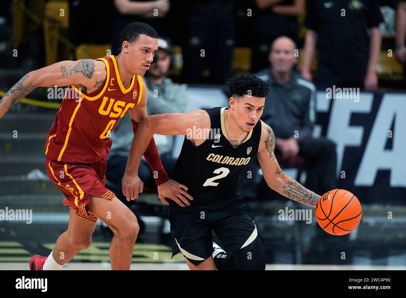 Colorado guard KJ Simpson, right, collects the ball as Southern ...