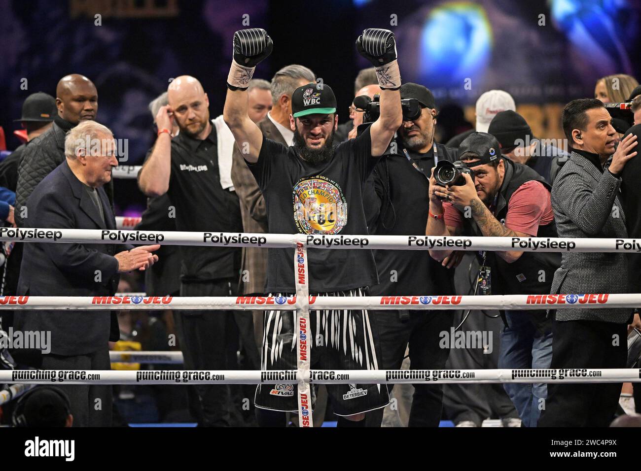 Quebec, Canada. 14th Jan, 2024. Artur Beterbiev, left, and Callum Smith ...