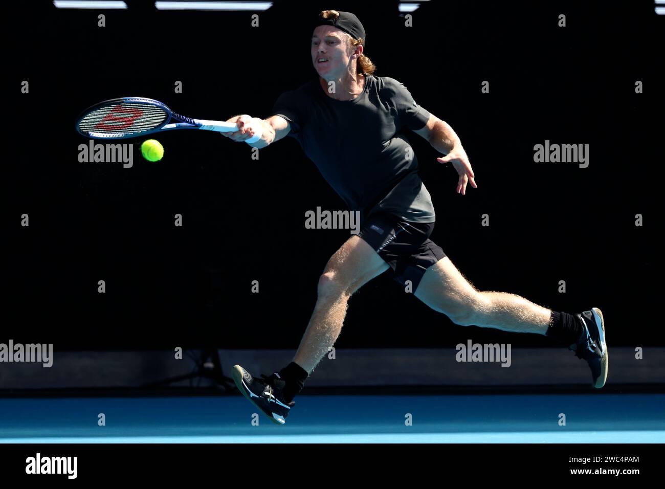 Dane Sweeny of Australia plays a forehand return to Francisco Cerundolo ...
