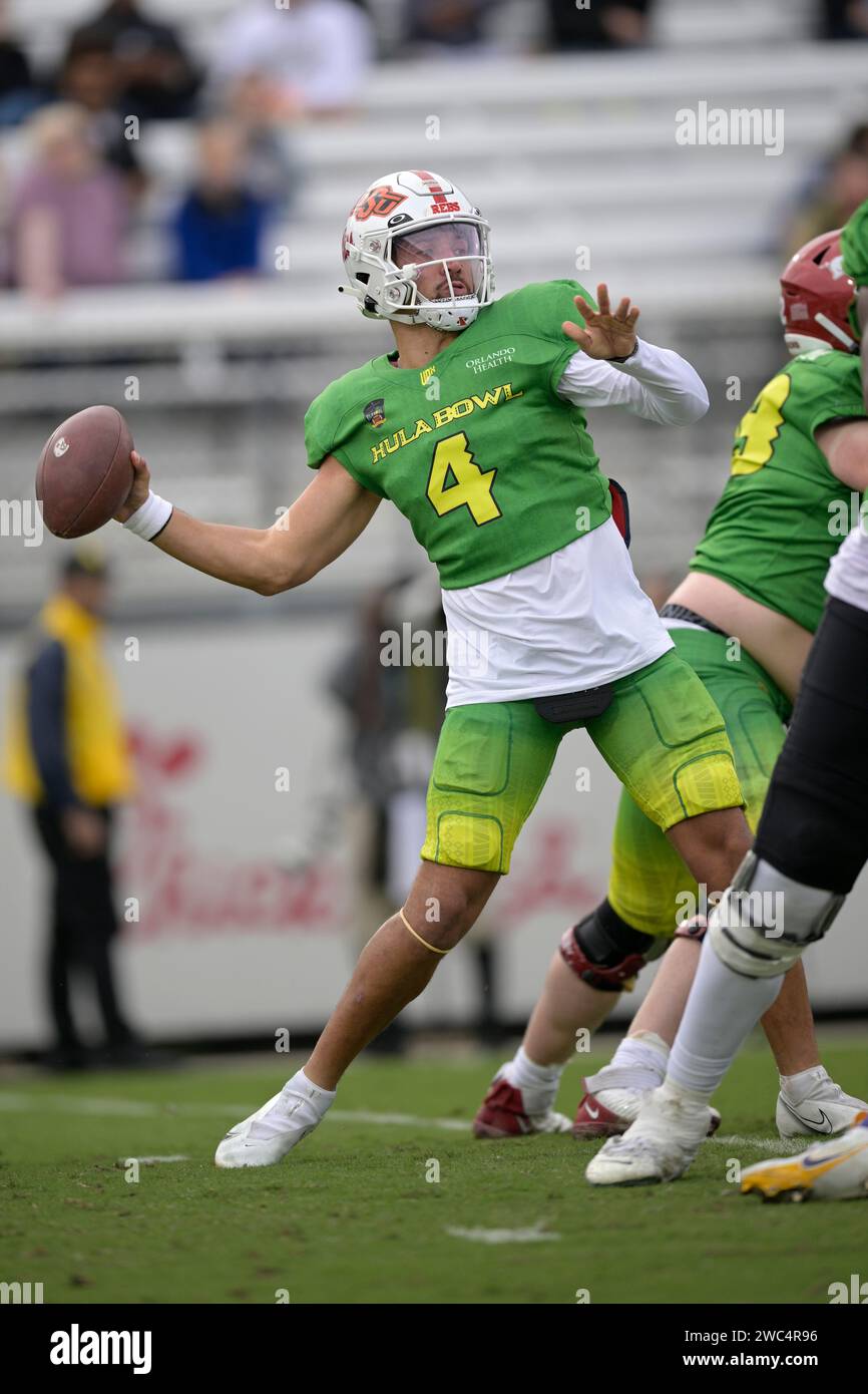 Team Aina quarterback Spencer Sanders (4), of Mississippi, throws a ...