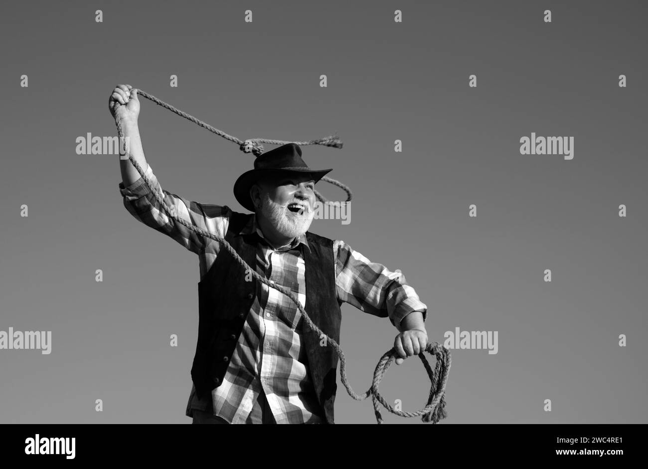 Cowboy roping horse Black and White Stock Photos & Images - Alamy