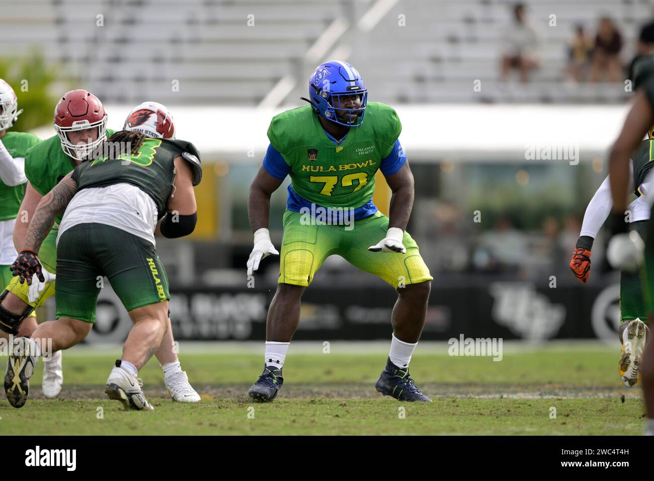 Team Aina offensive tackle Travis Glover (72), of Georgia State, sets ...