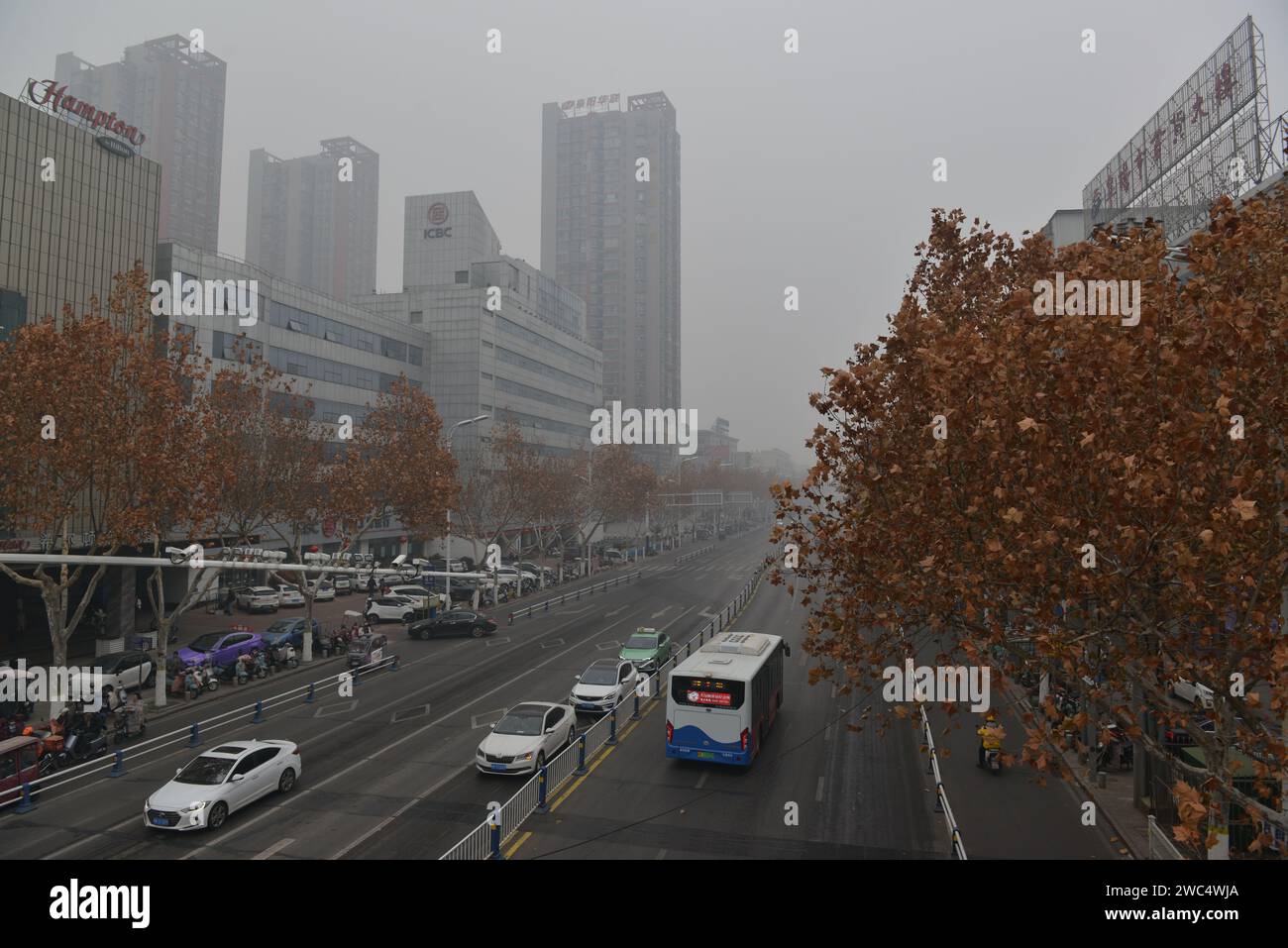 FUYANG, CHINA - JANUARY 14, 2024 - The urban area is shrouded in smog ...
