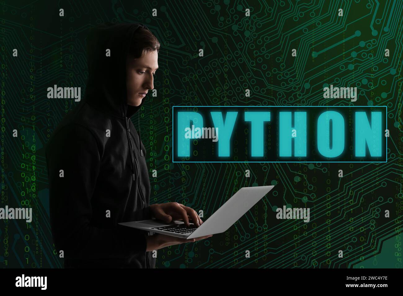 Professional hacker with laptop on dark background Stock Photo - Alamy