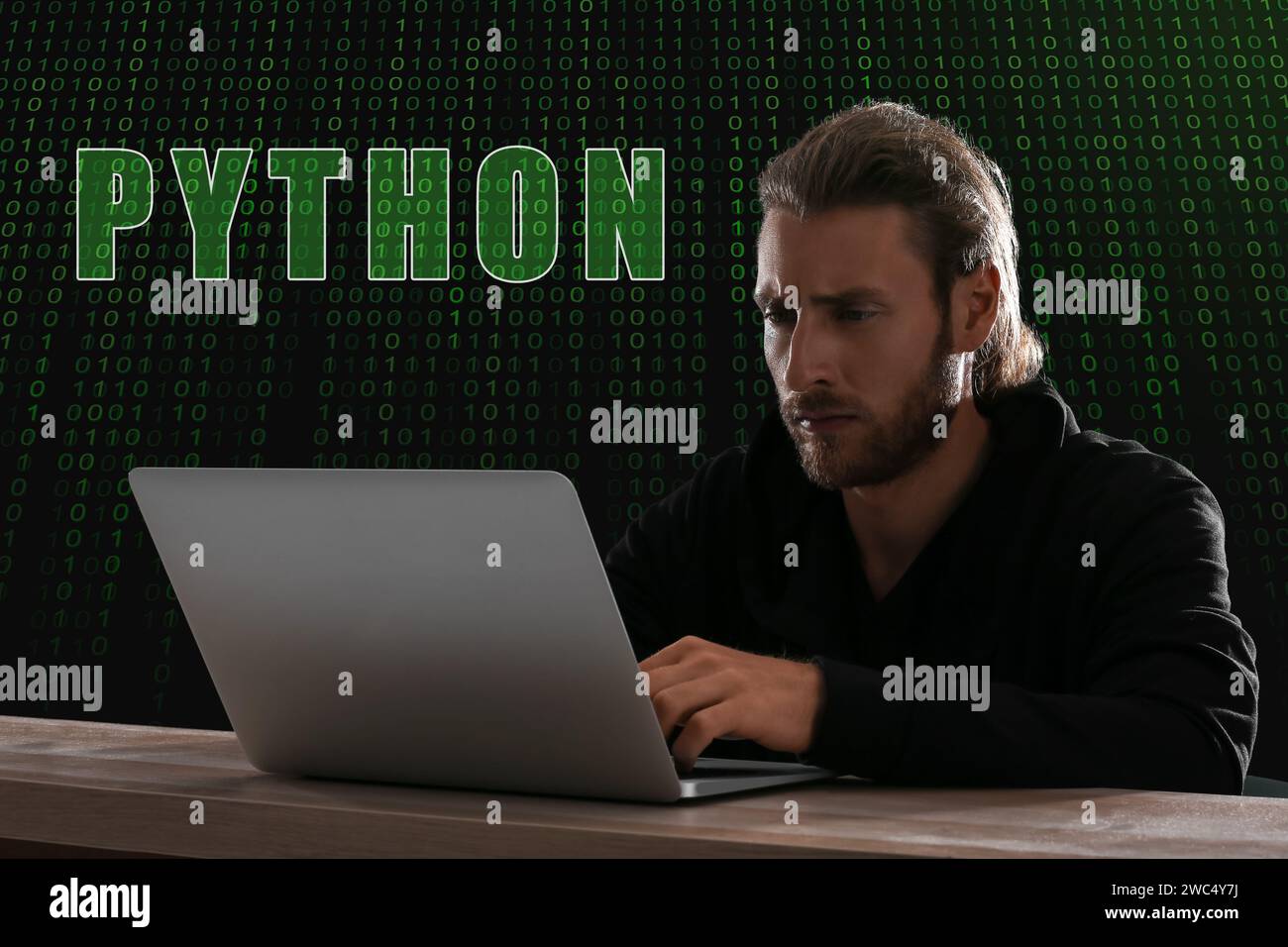 Professional hacker with laptop on dark background Stock Photo - Alamy