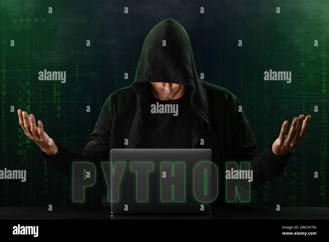 Professional hacker with laptop on dark background Stock Photo - Alamy