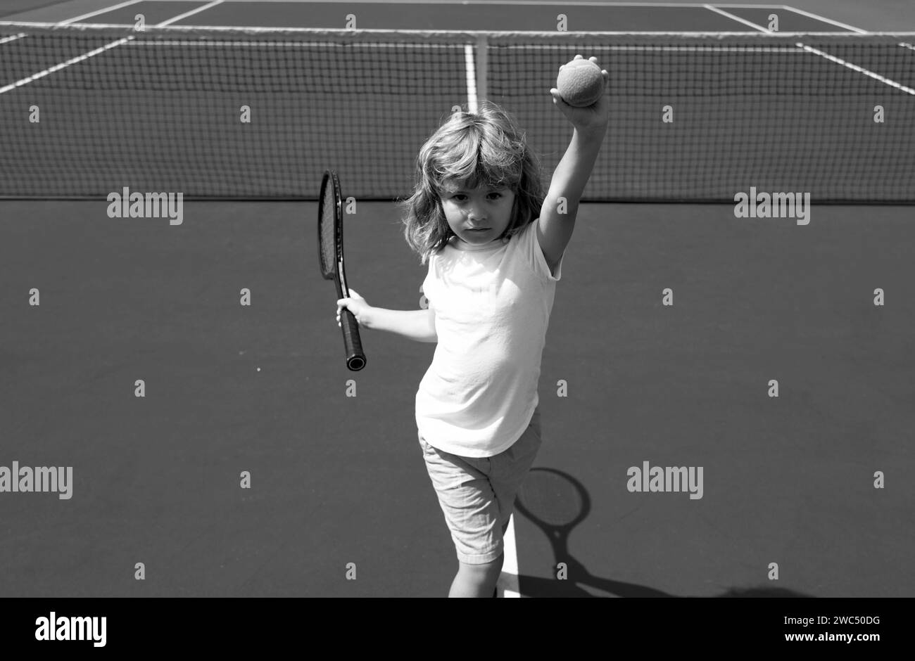 Little boy playing tennis. Sport kids. Child with tennis racket on ...