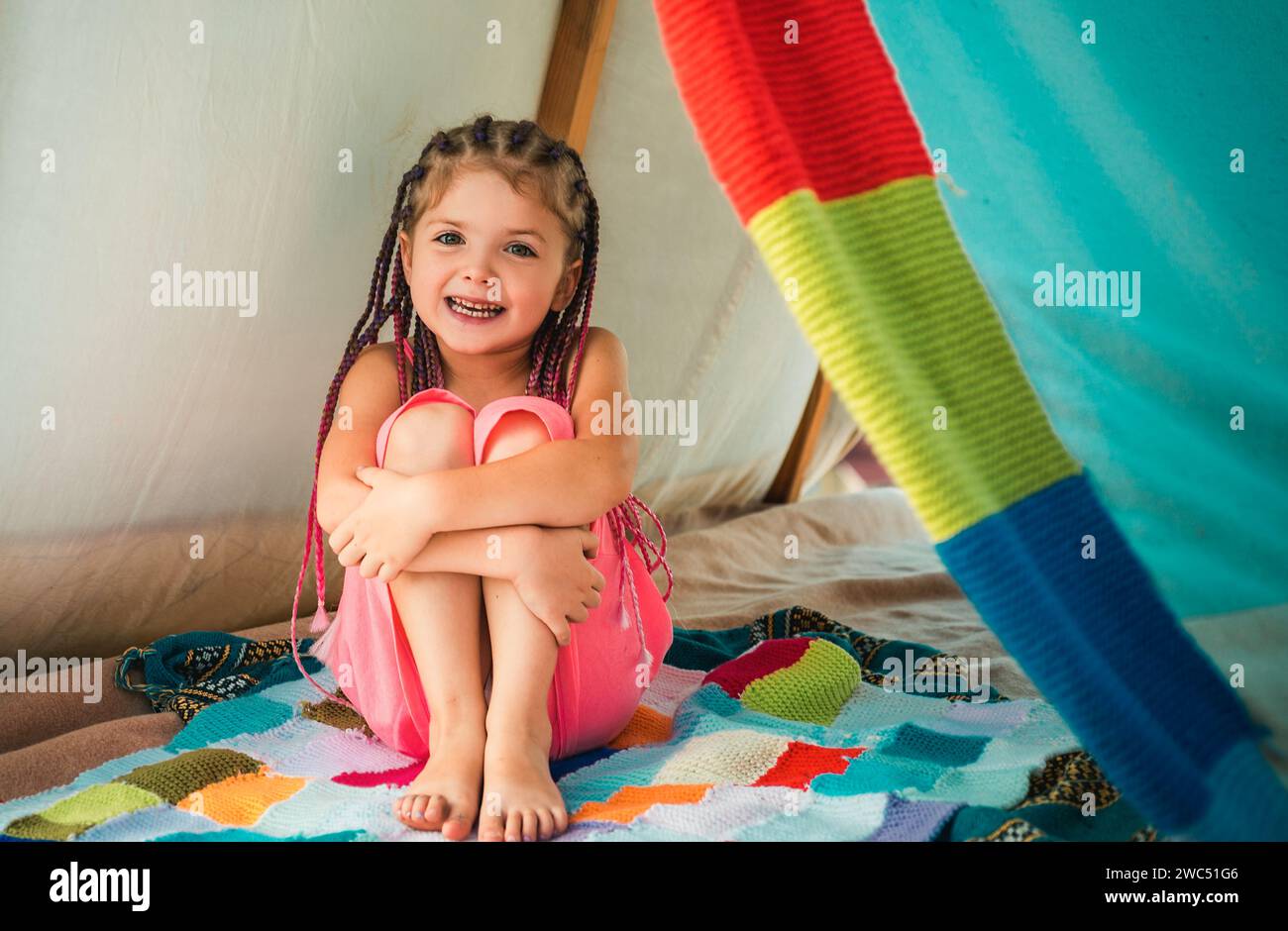 Girl playing in tent. Child camping at campground outdoor. Having fun ...