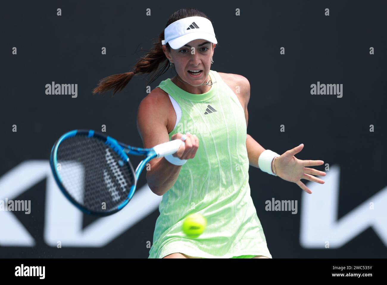 Melbourne, Australia. 14th Jan, 2024. Elina Avanesyan hits a return ...
