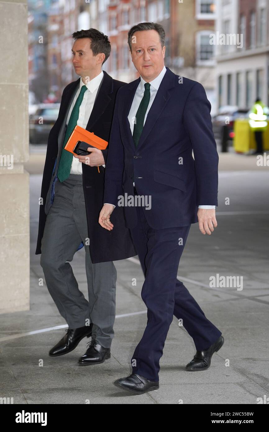 Foreign Secretary Lord David Cameron (right) arrives at BBC ...