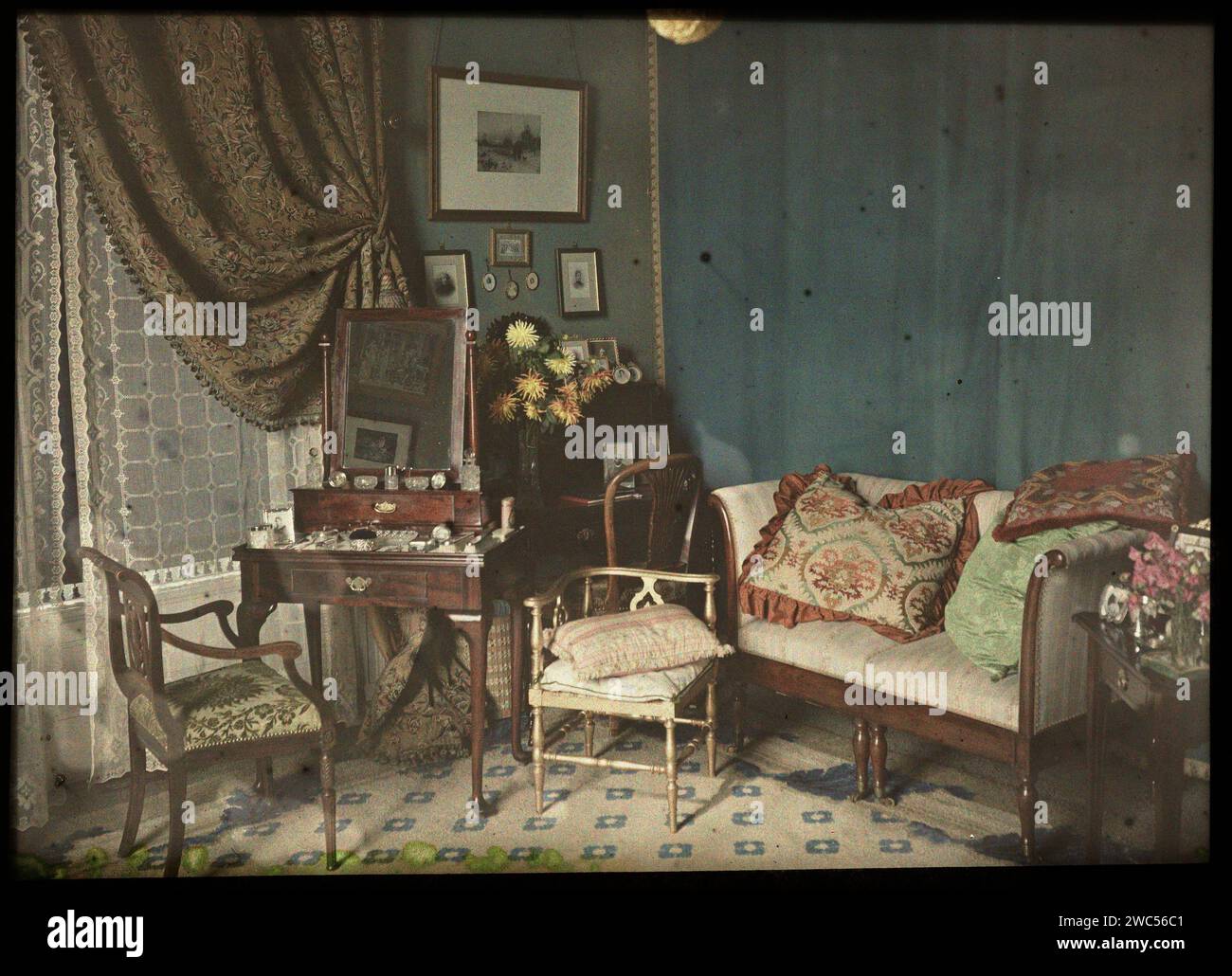 Women's room with toilet table and sofa, Anonymous, 1915 - 1925 photograph slide Stock Photo - Alamy