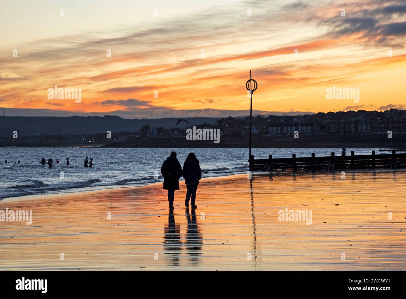 Portobello, Edinburgh, Scotland, UK. 14 January 2024. Onlookers on the ...