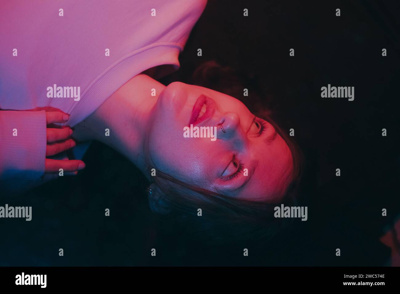 A unique perspective captured from below, showcasing a person with ...