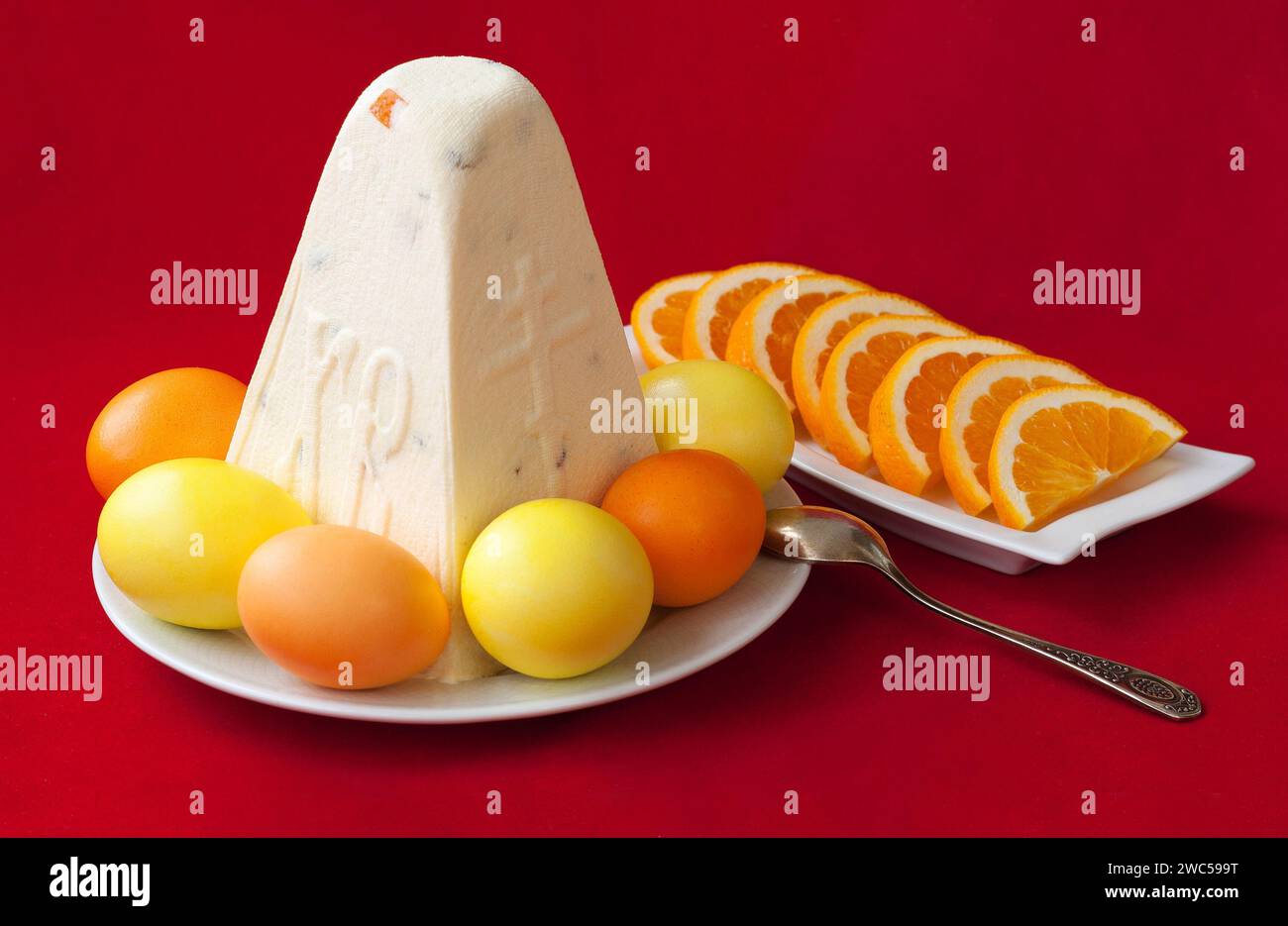Traditional Easter cottage cheese dessert Paskha with eggs and oranges ...