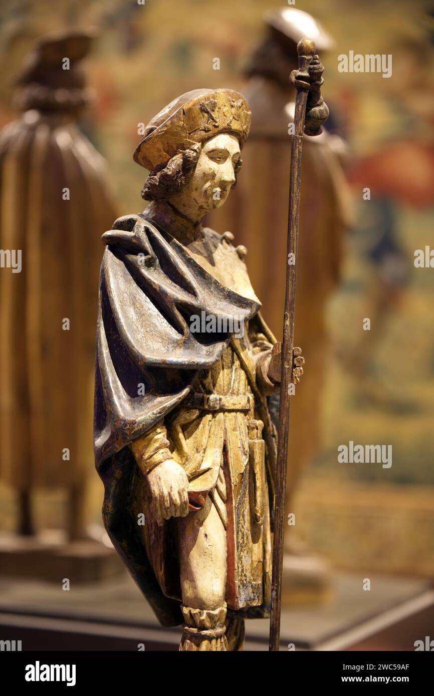 Medieval Splendor: Gilded Saint Sculpture Stock Photo - Alamy